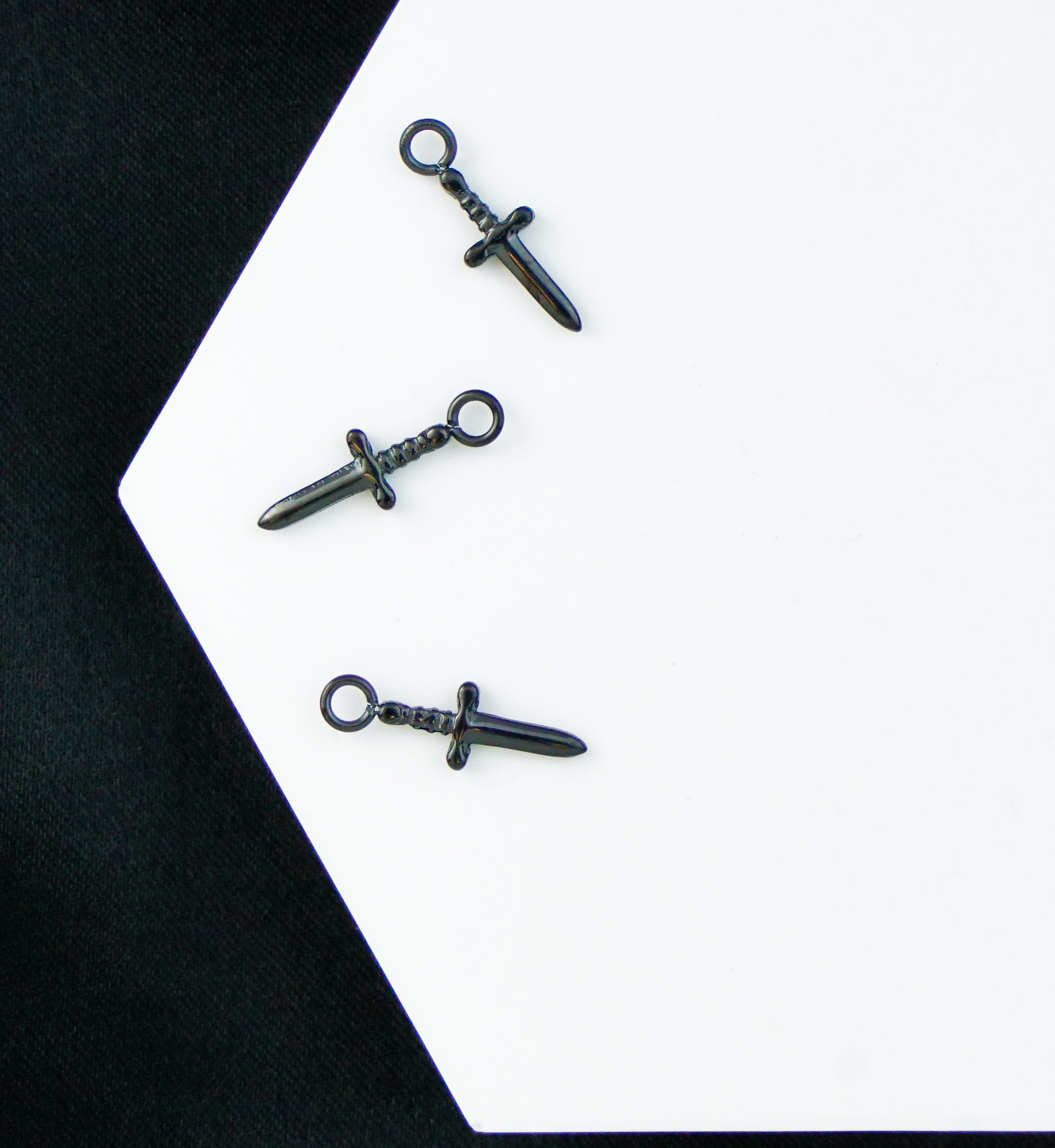 Black PVD Dagger Titanium Charm | UrbanBodyJewelry.com