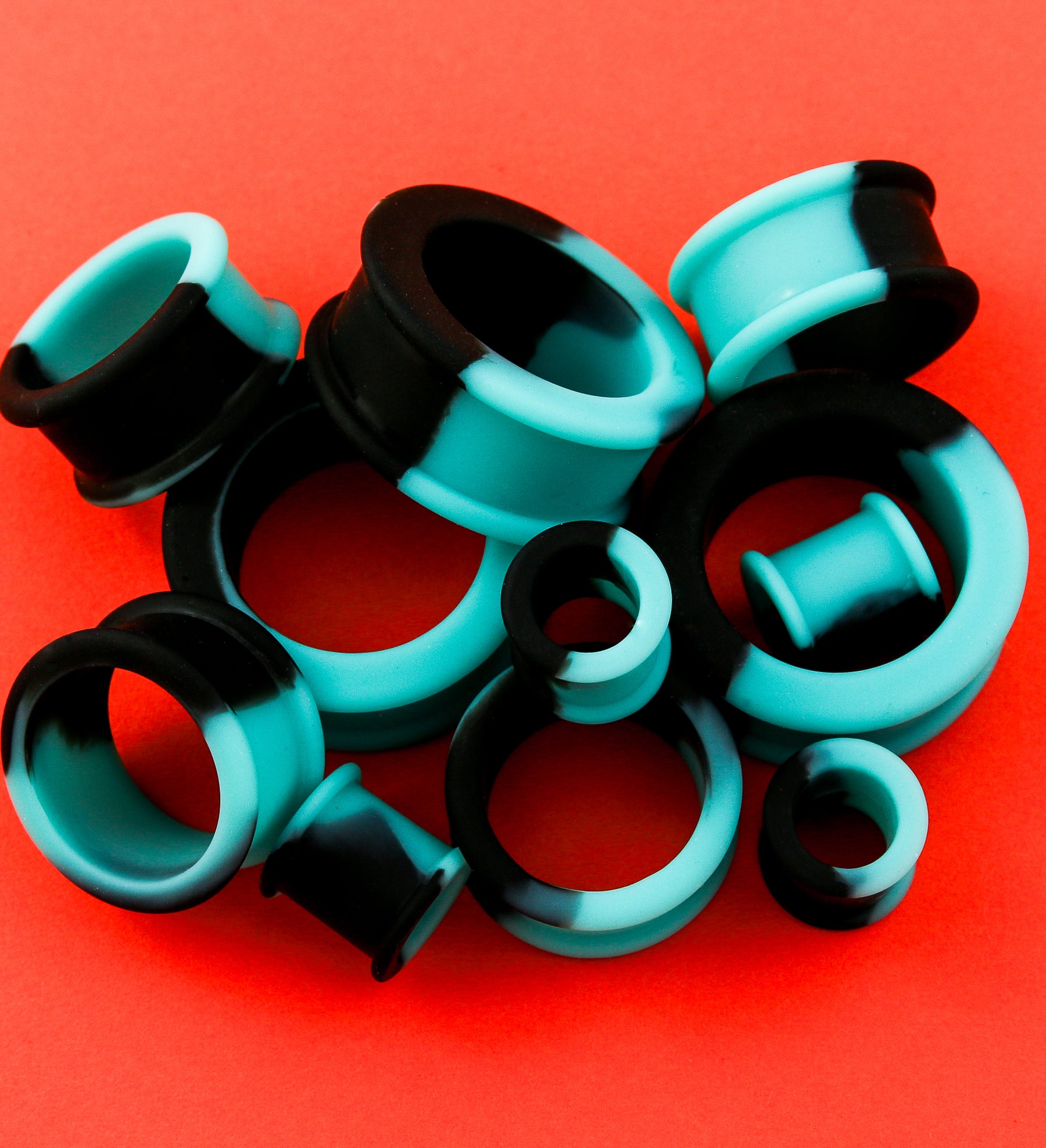 Teal And Black Double Flare Silicone Plugs (2G - 1&1/2")